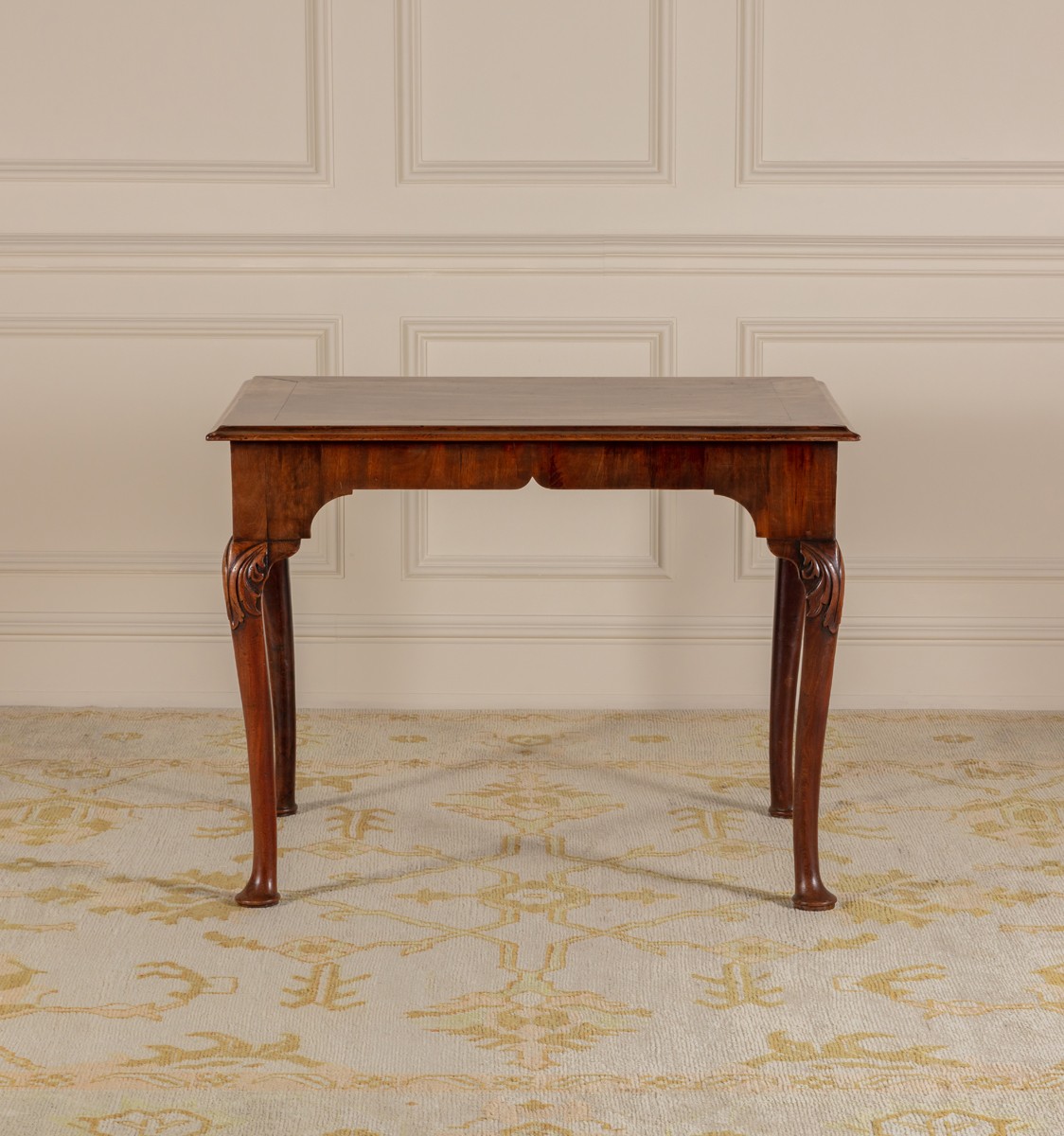 A fine George II Mahogany centre table having a crossbanded top and ...