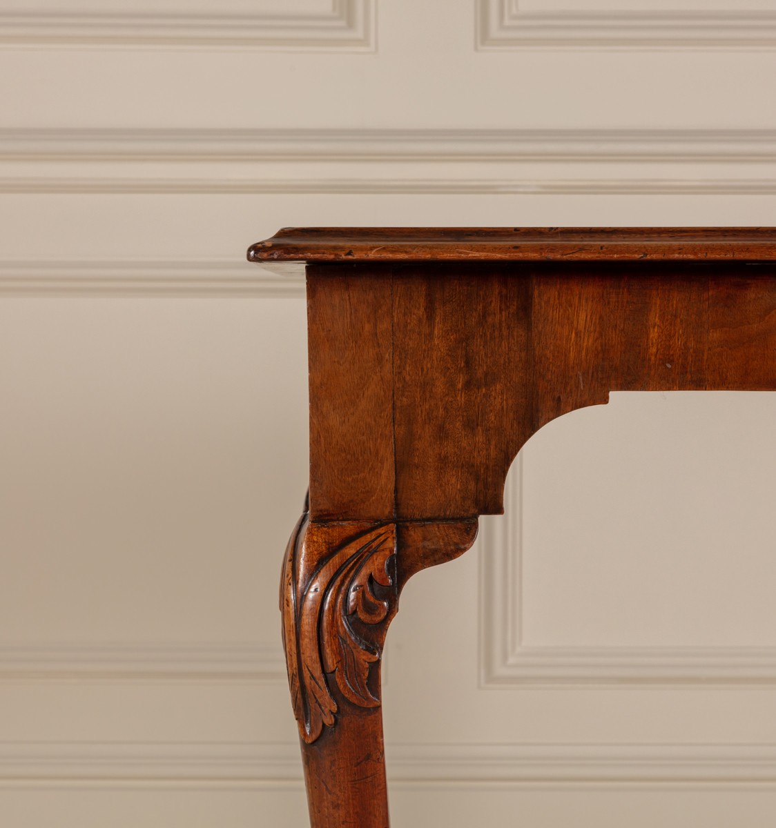 A fine George II Mahogany centre table having a crossbanded top and ...