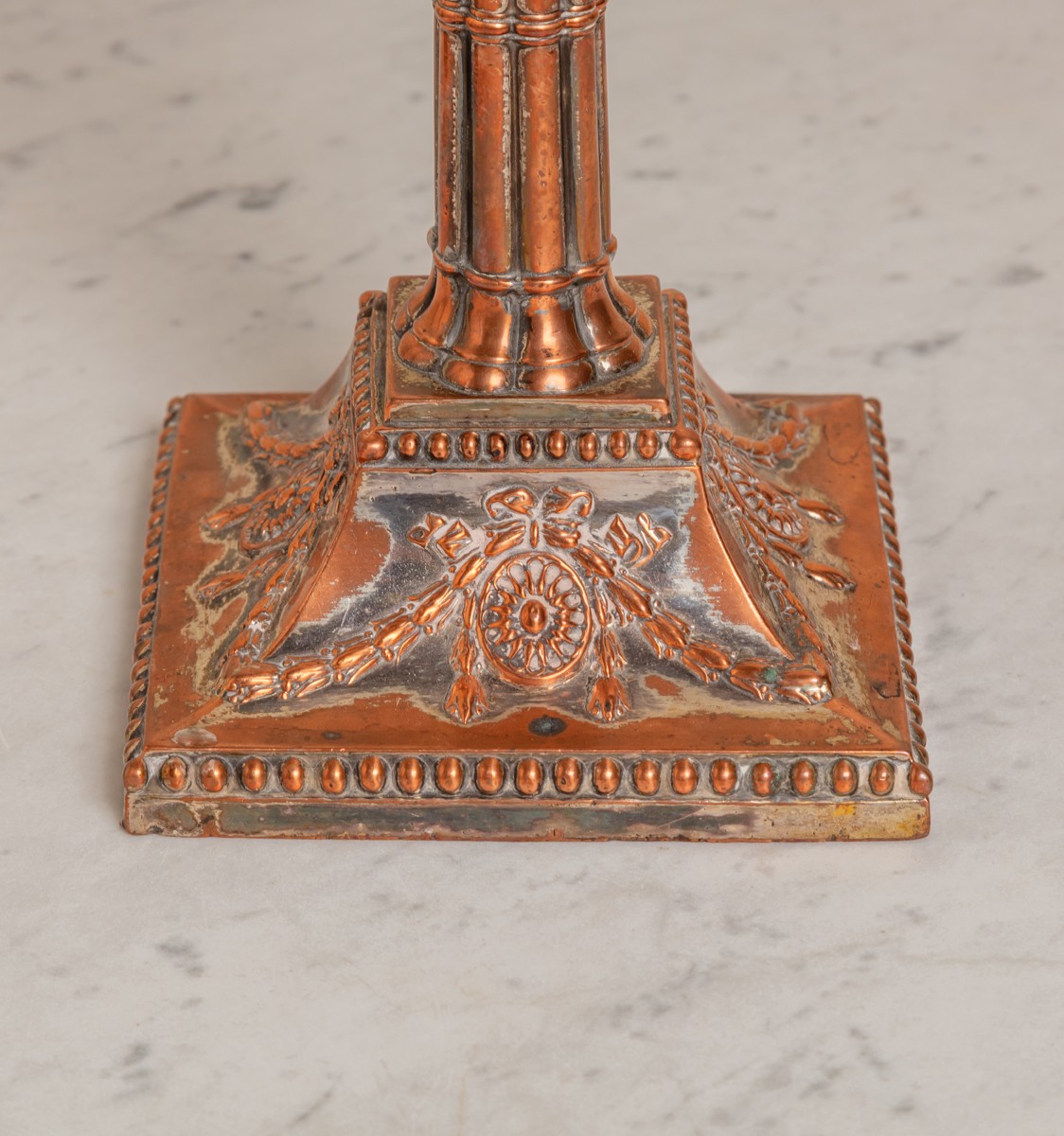 A set of four silver plated cluster column candlesticks, circa 1800 ...